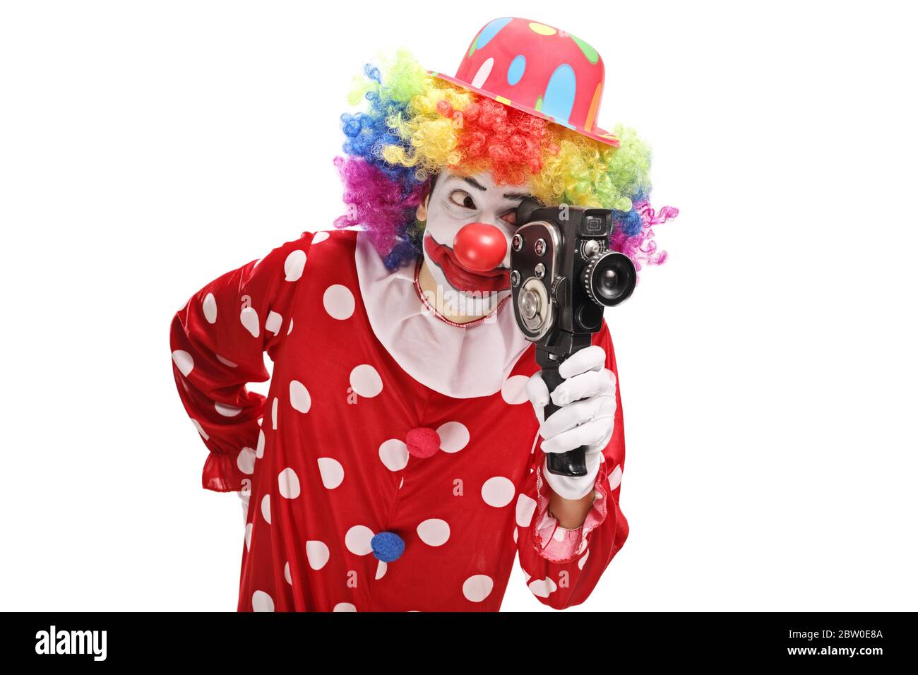 Clown holding a vintage camera isolated on white background Stock Photo ...