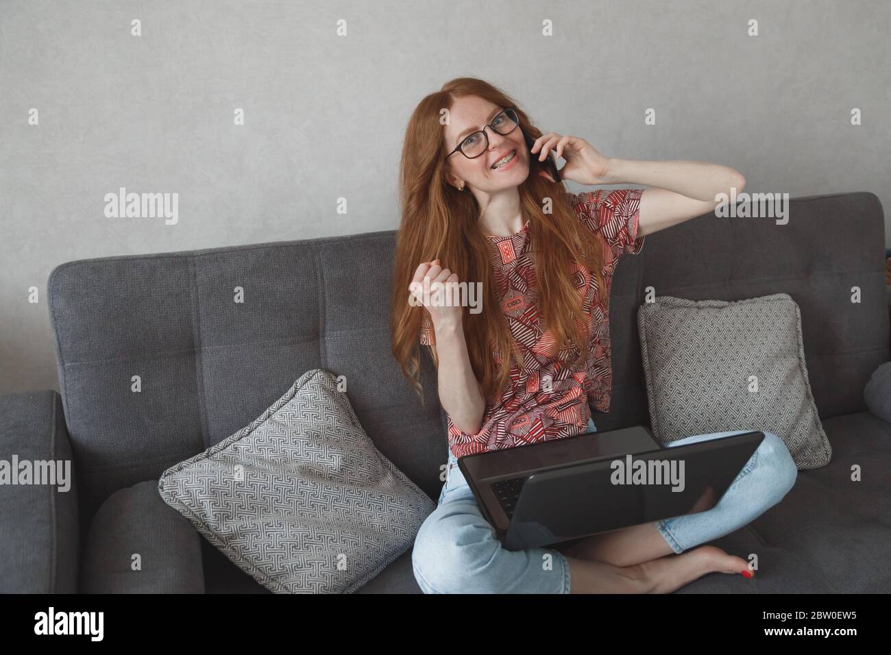 Lucky successful woman feel relieved happy, yelling yeah waving hands ...