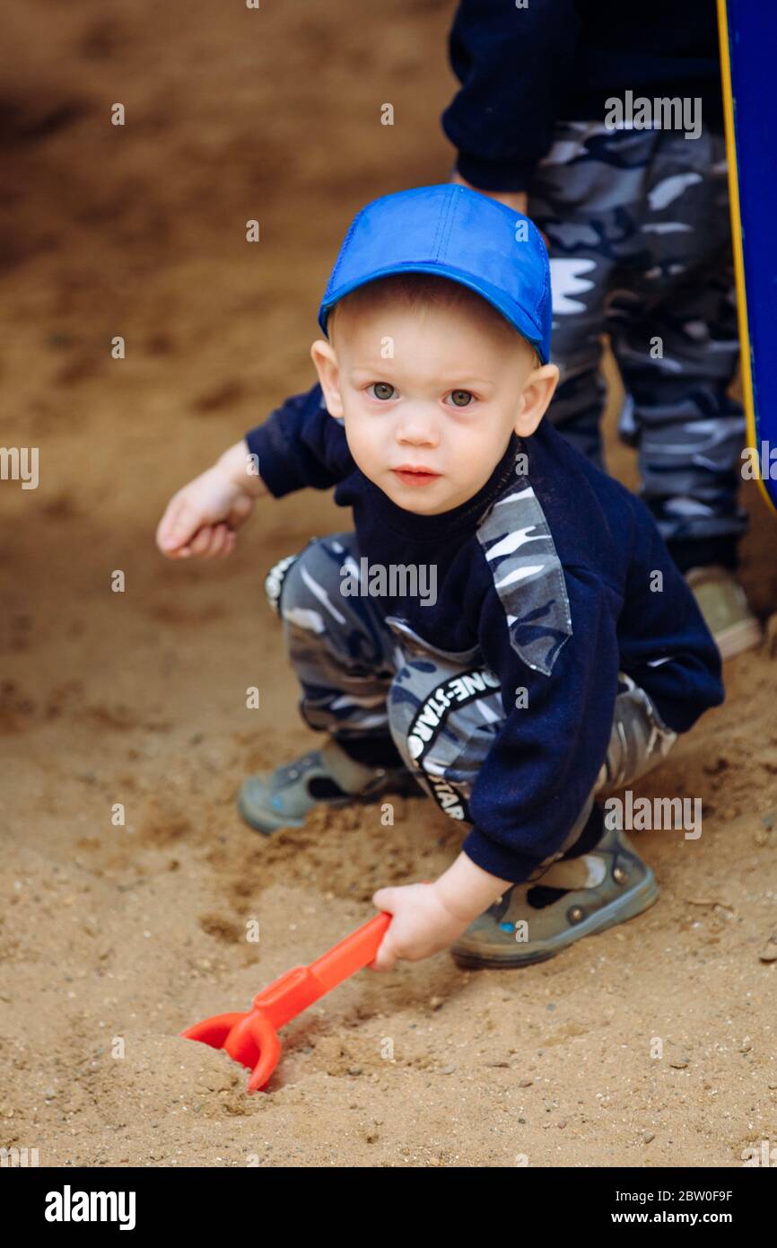 Boy bucket sand hi-res stock photography and images - Alamy