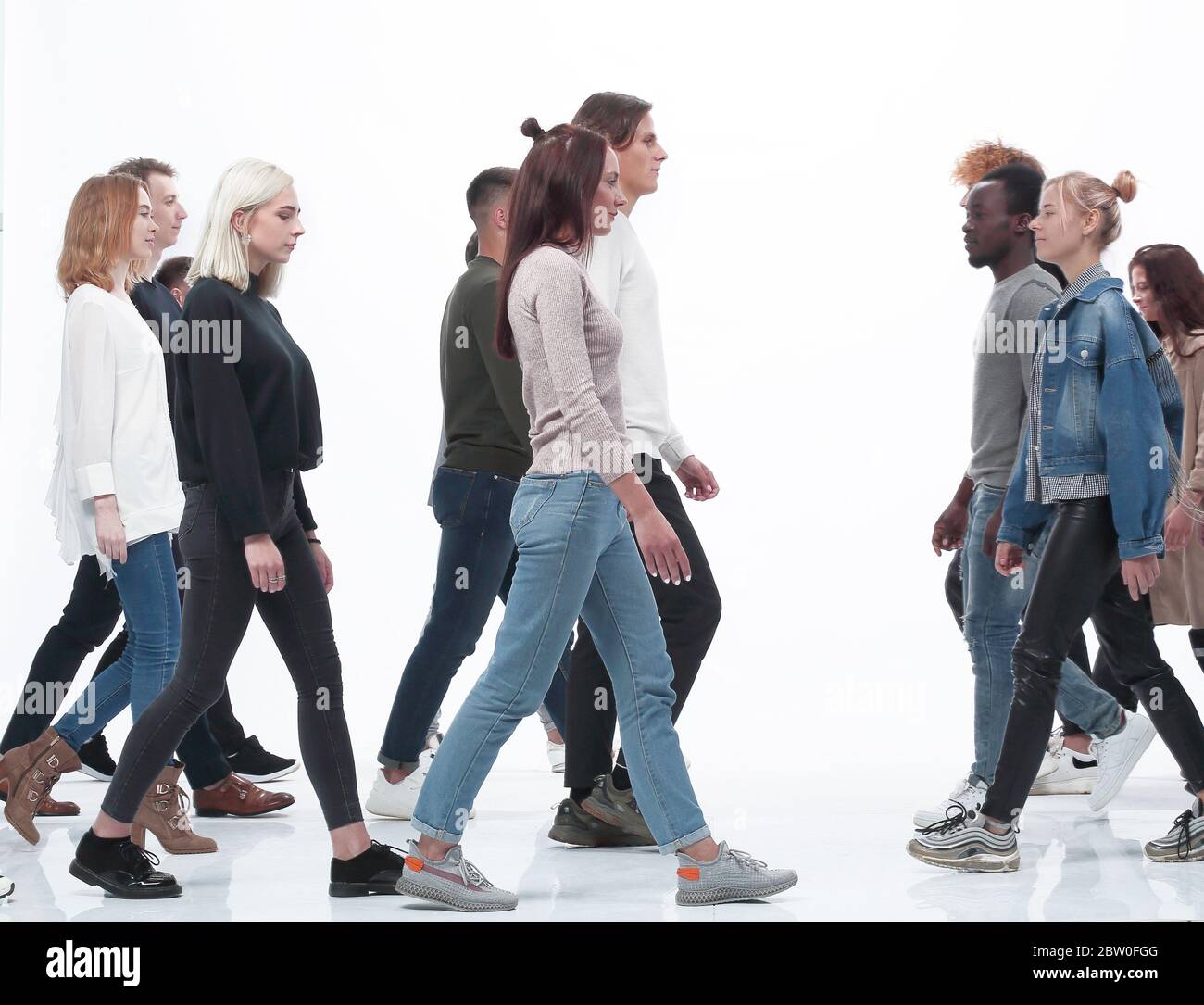 casual young people walking in different directions Stock Photo - Alamy