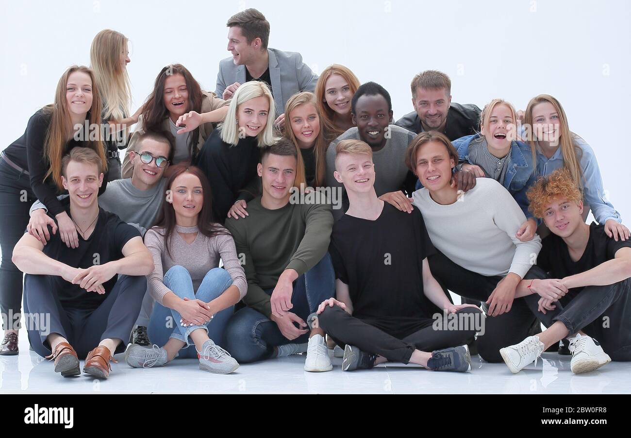 in full growth. a large group of friends gathered together Stock Photo ...