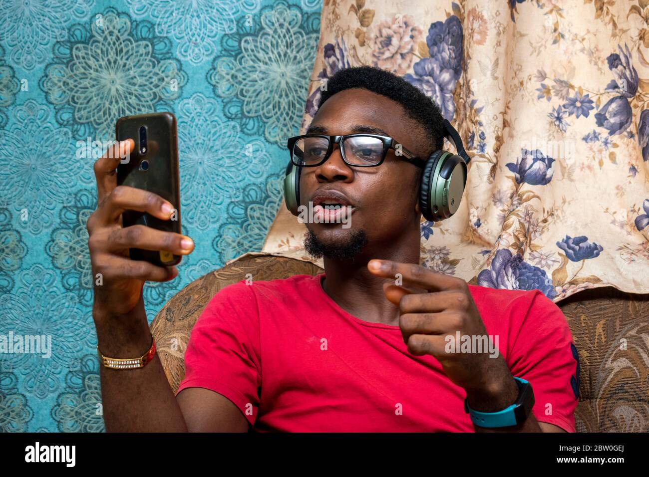 Speaking black man wearing hi-res stock photography and images - Alamy