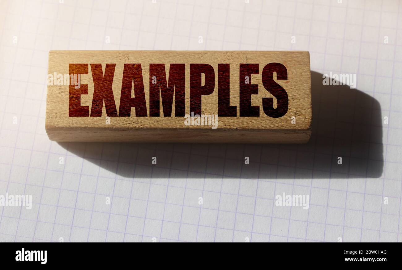 Examples word written on wood block. Education concept Stock Photo - Alamy