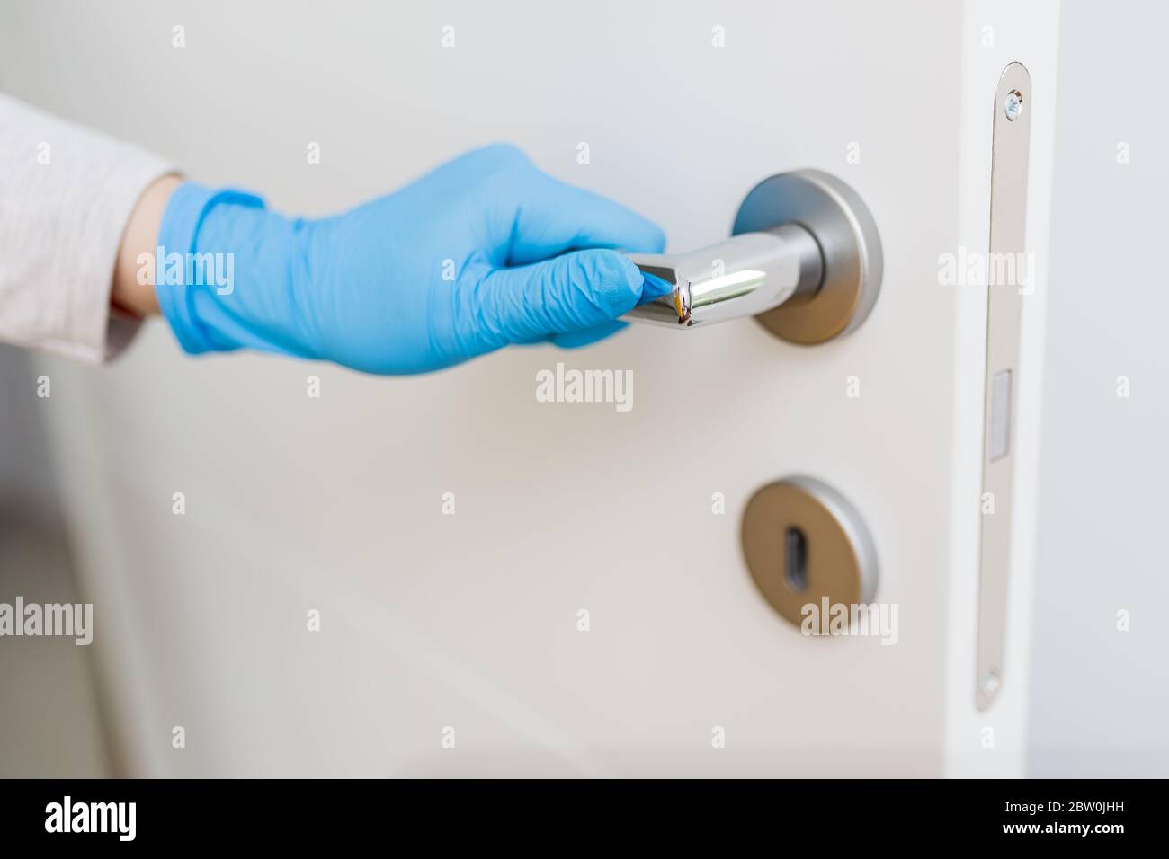 Hand Door Handle Glove High Resolution Stock Photography and Images - Alamy