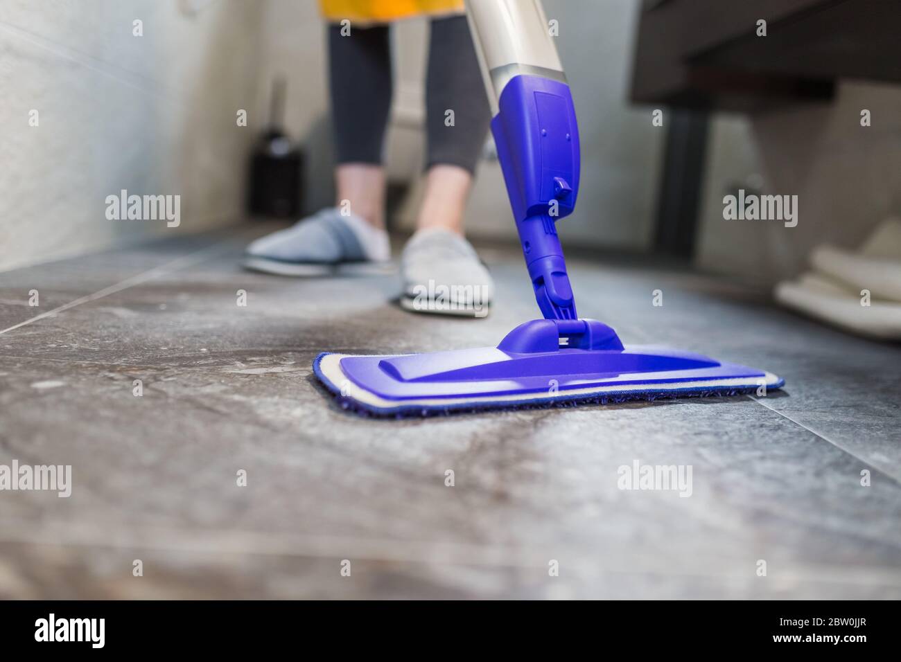 Close up woman mop cleaning hi-res stock photography and images - Alamy