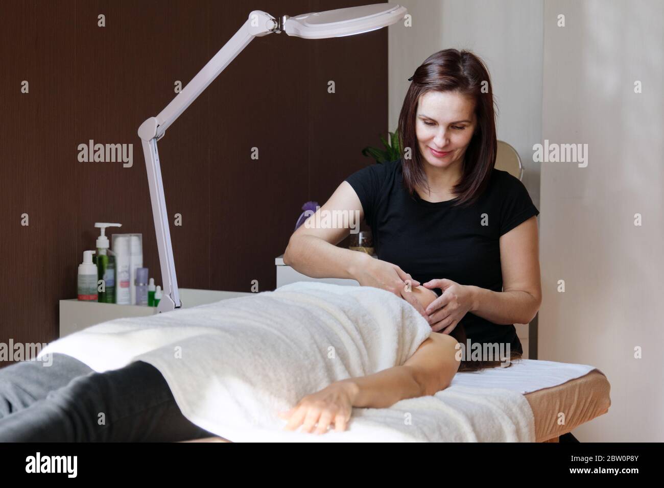 Professional facial massage, spa, beauty, face concept Stock Photo - Alamy