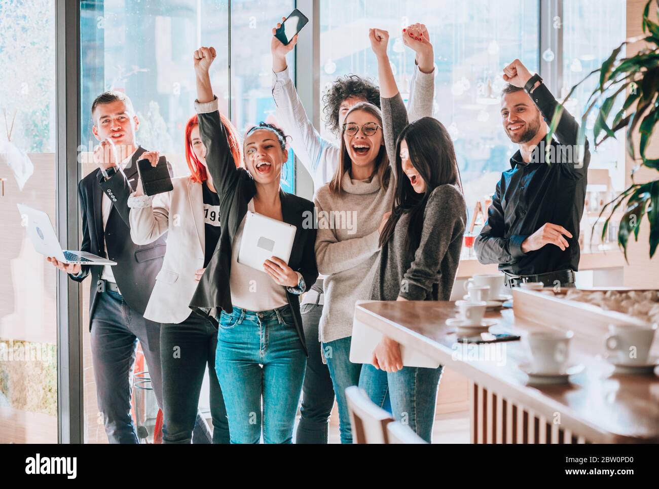 Young modern coworkers hanging out together after a work appointment ...