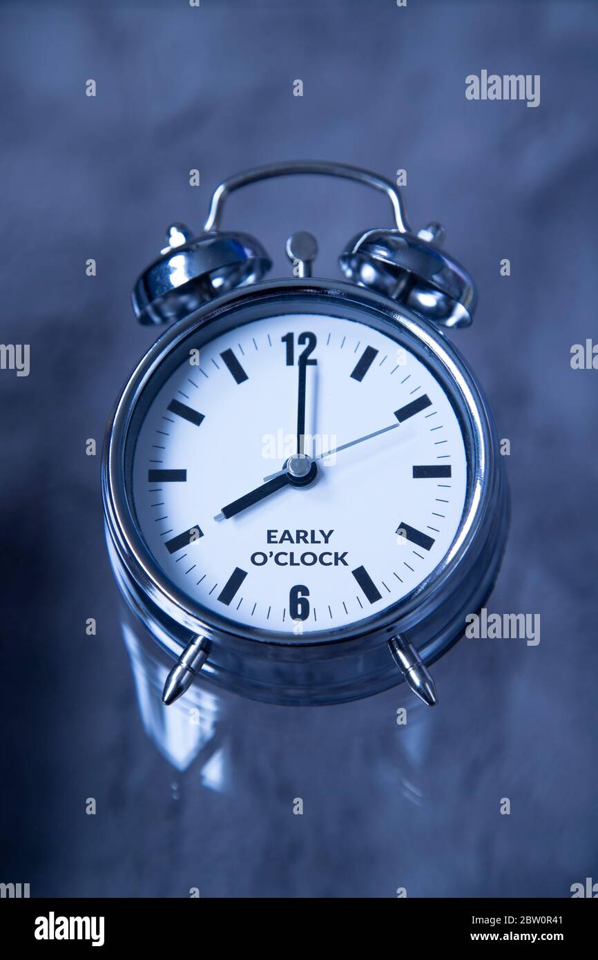 old school alarm clock showing 8 inscribed with early o'clock Stock ...