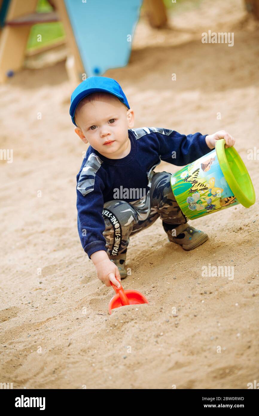 Boy bucket sand hi-res stock photography and images - Alamy