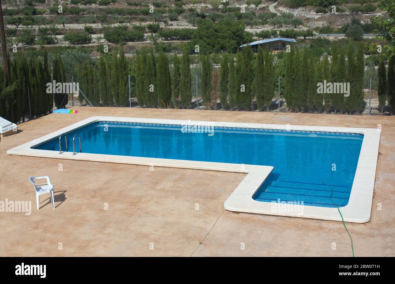 Image of an outdoor general public pool for sunbathing and swimming in ...