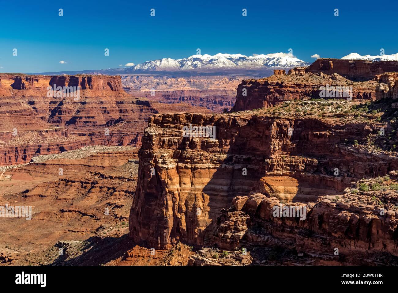 Shafer Canyon, with La Sal Mountains distant, in Island in the Sky in ...