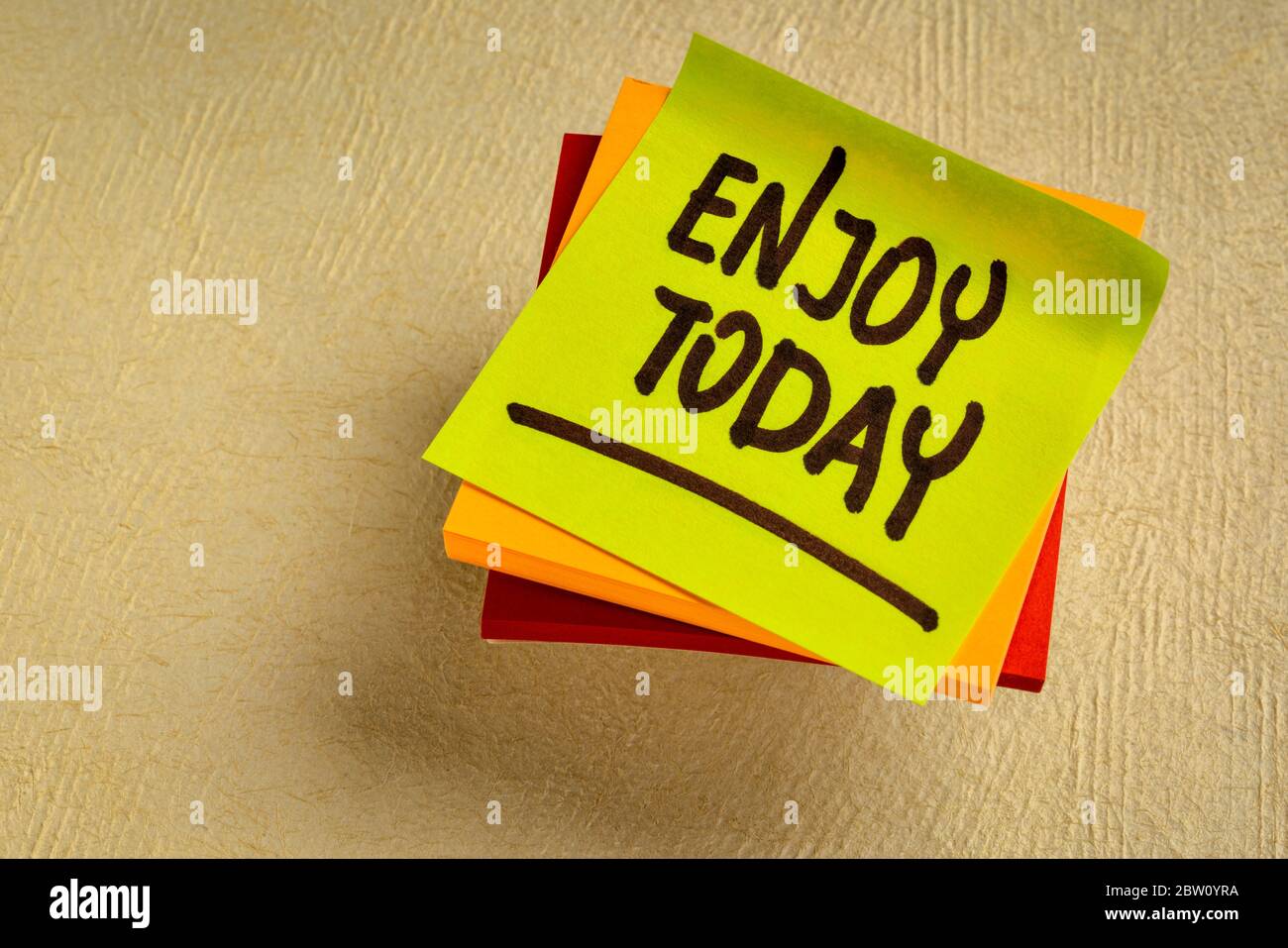 Enjoy today reminder - handwriting on a sticky note, positive attitude ...
