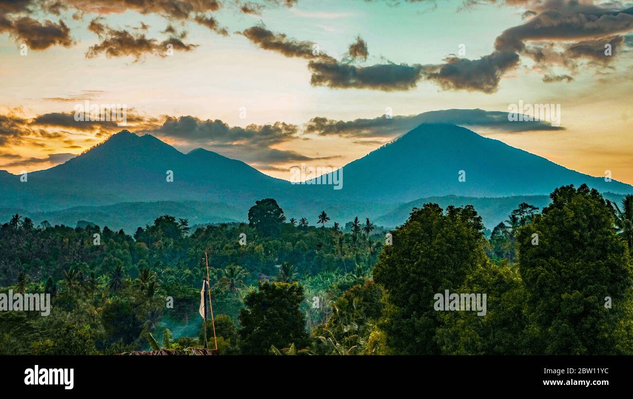 A view of two mountains in the morning Stock Photo - Alamy