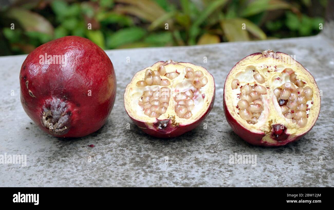 Fresh open pomegranates hi-res stock photography and images - Alamy