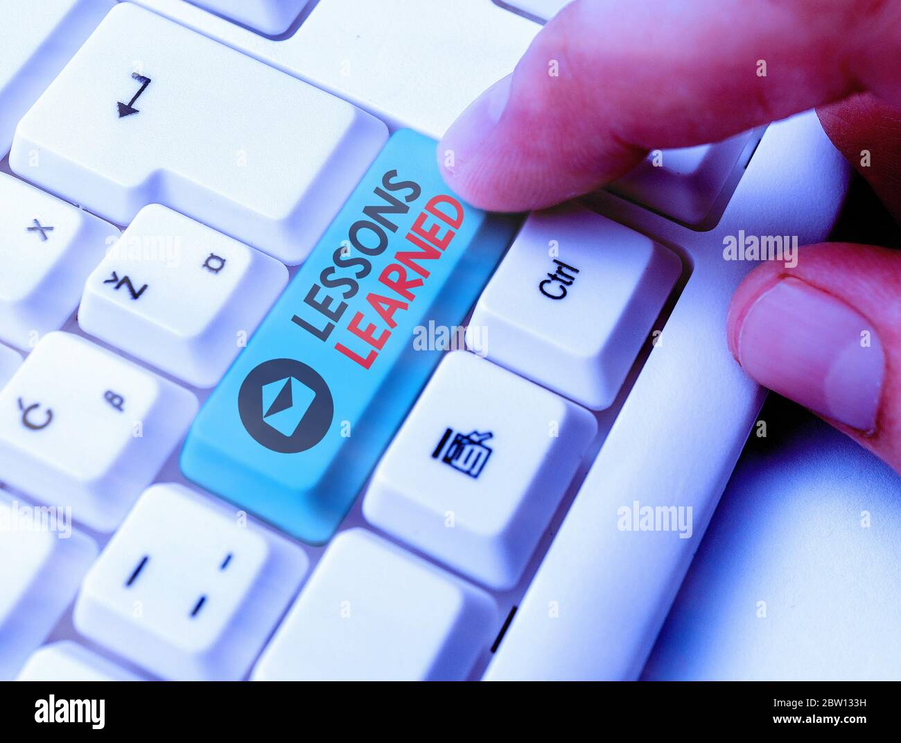 Writing note showing Lessons Learned. Business concept for the knowledge or understanding gained ...