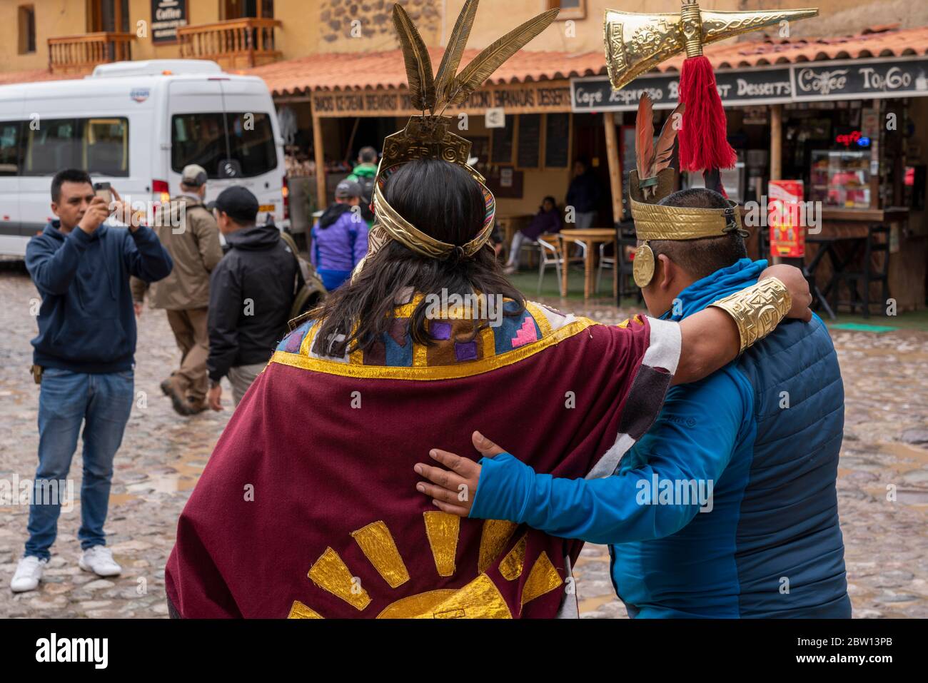 Tourist gets portrait with Quechnuan Man dressed up as Inca Warrior ...