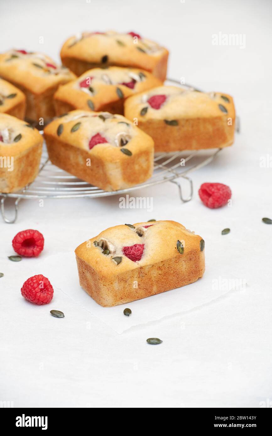 Homemade mini banana and raspberry loaf cakes Stock Photo - Alamy
