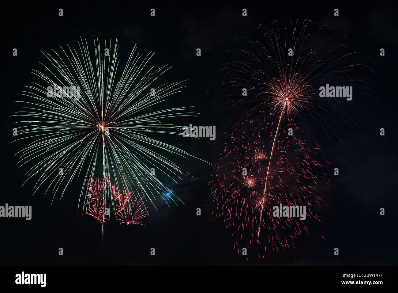 Colorful fireworks display at holiday night Stock Photo - Alamy