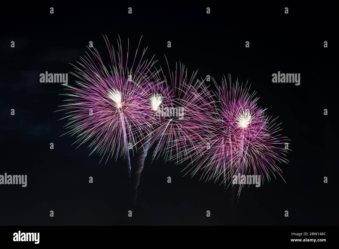 Colorful fireworks display at holiday night Stock Photo - Alamy