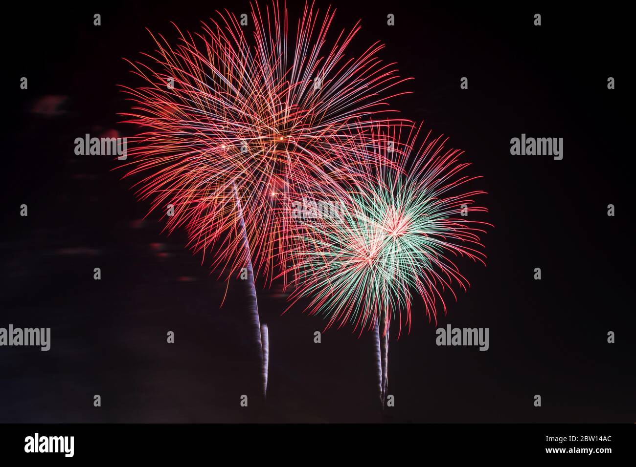 Colorful fireworks display at holiday night Stock Photo - Alamy