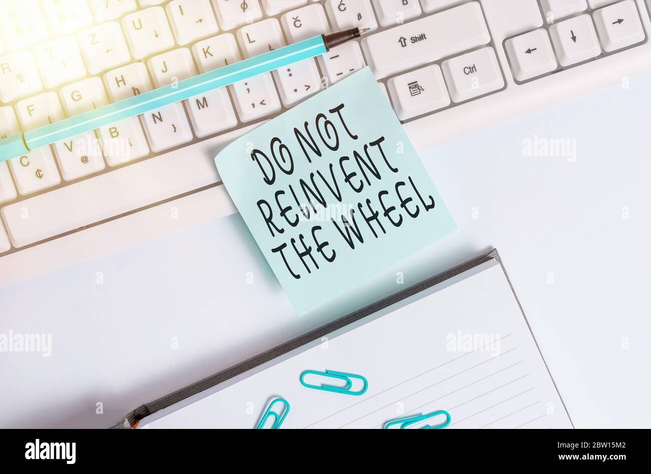 Writing note showing Do Not Reinvent The Wheel. Business concept for ...