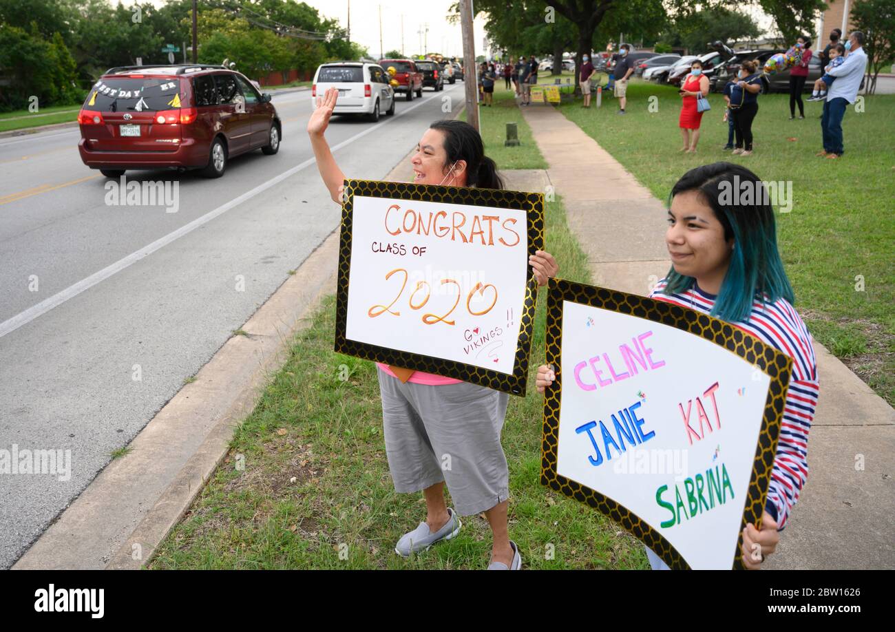 Family members and neighbors watch graduates of Navarro Early College ...