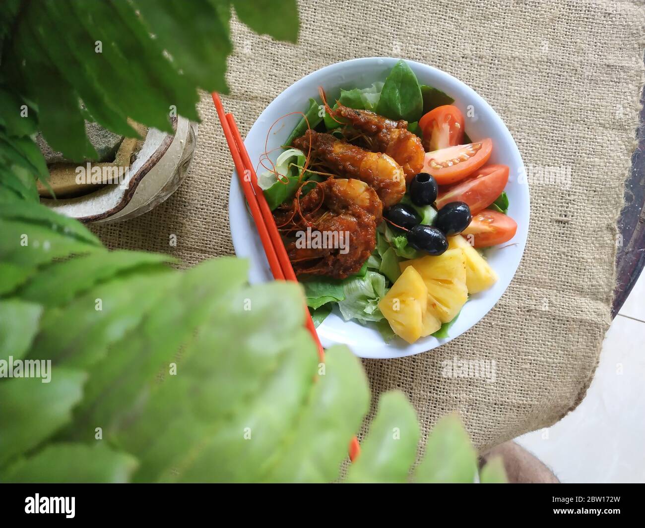 Fried Shrimp With Vegetables chunks of pineapple in a bowl Stock Photo ...