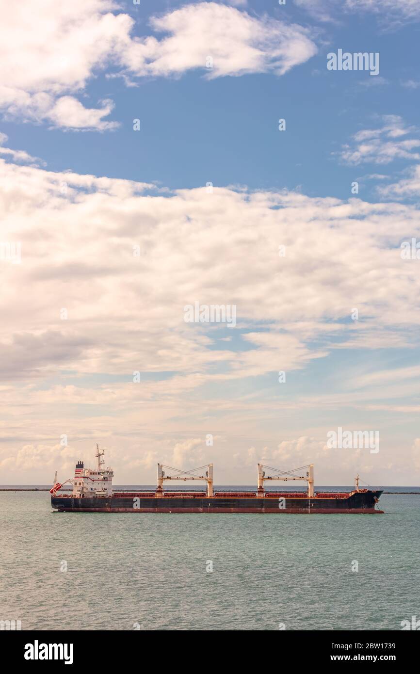 Oil tanker in Panama Canal. Clouds and blue sky as a background Stock ...