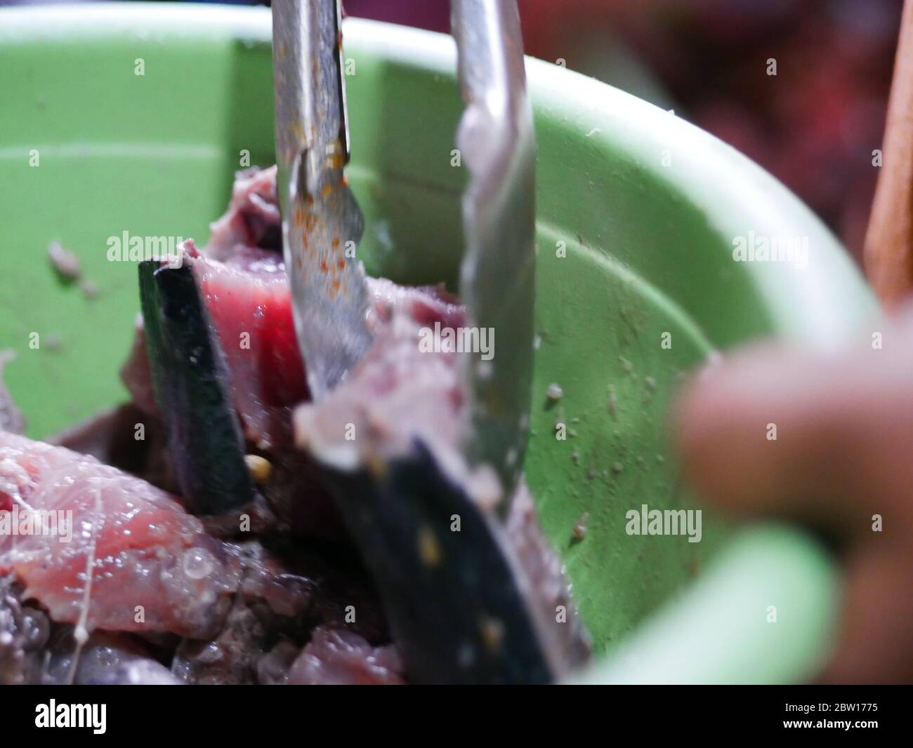 Fresh slice milkfish in plastic basket Stock Photo - Alamy