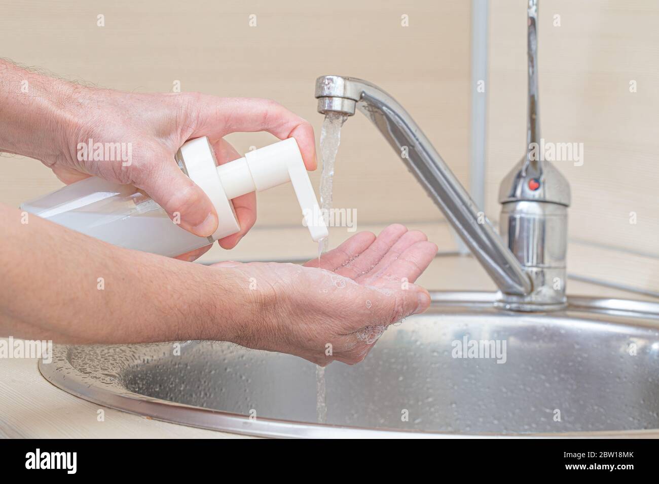 Coronavirus pandemic protection by cleaning hands frequently, hygiene ...