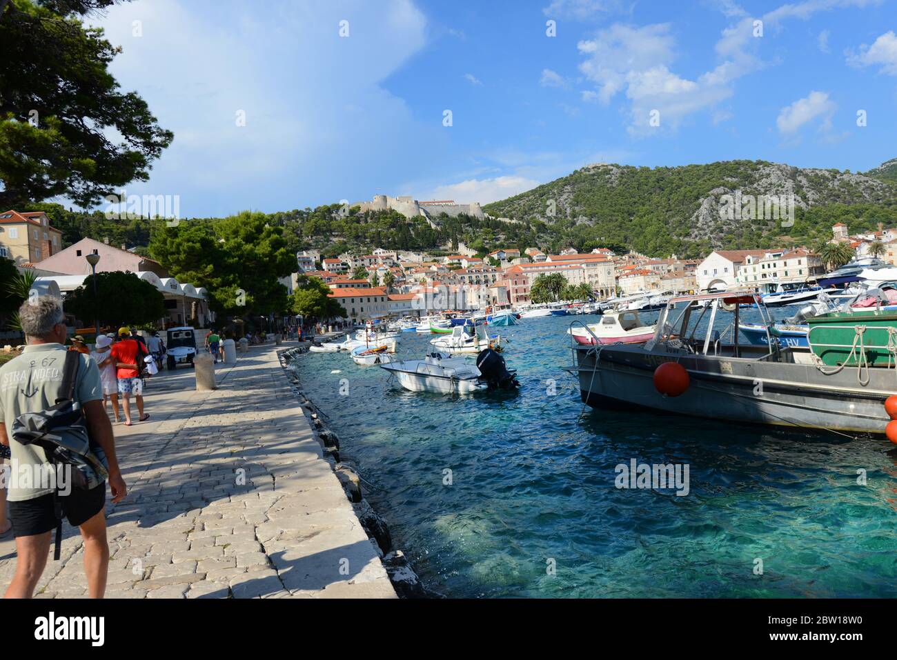 Walking on the waterfront promenade in Hvar, Croatia Stock Photo - Alamy