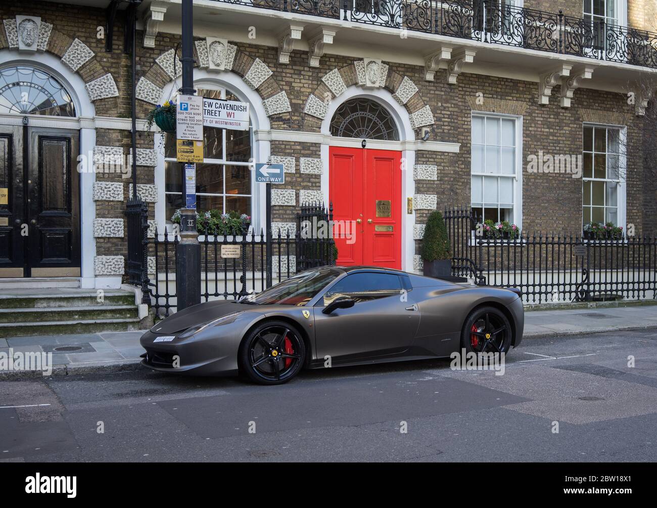 Ferrari parked on street hi-res stock photography and images - Alamy