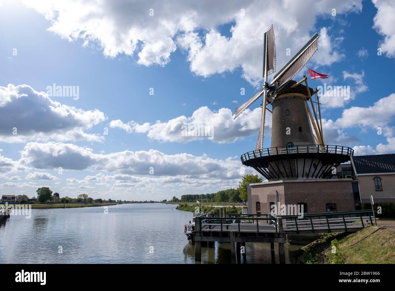 Traditional setting of the historical dutch windmills landscape at the ...