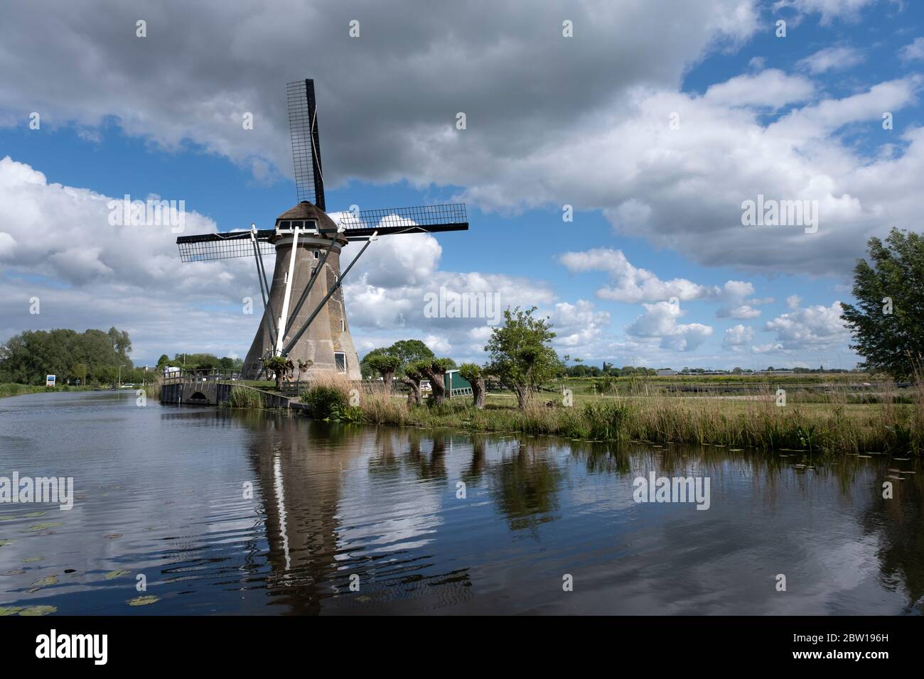 Traditional dutch windmill near the canal. Netherlands. Unesco site ...