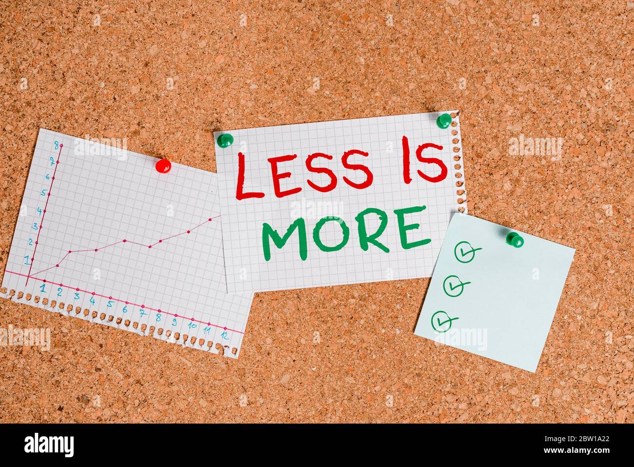 Writing note showing Less Is More. Business concept for used to express ...