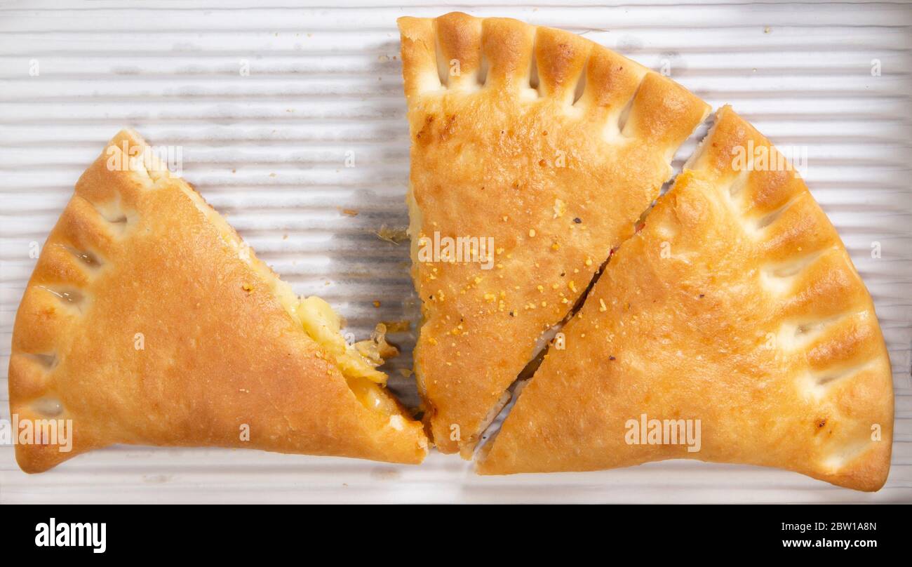 Pizza on a separate paper tray background Stock Photo - Alamy