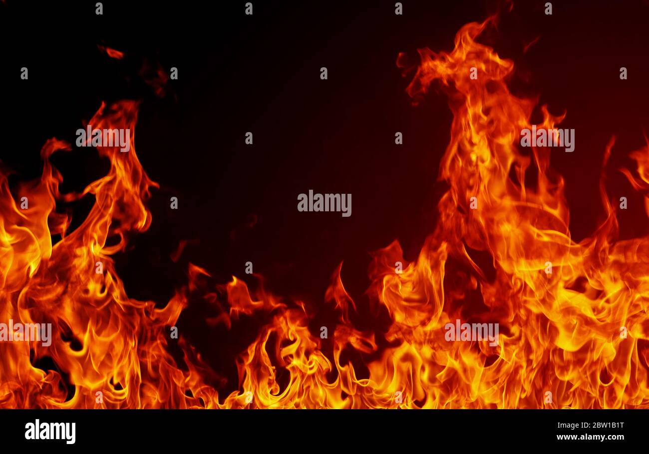 Fire flames on black background Stock Photo - Alamy