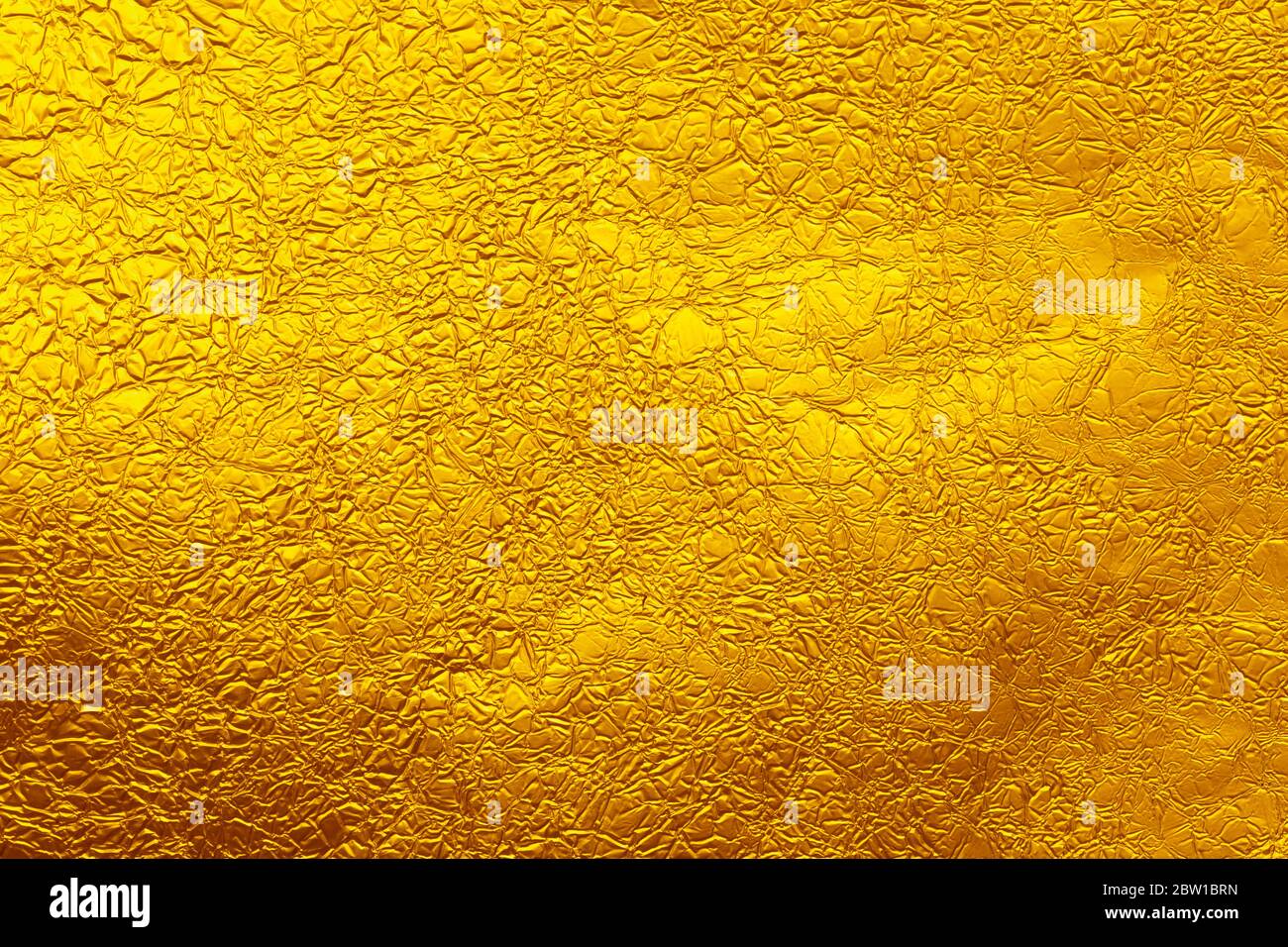 Gold foil abstract background texture Stock Photo - Alamy