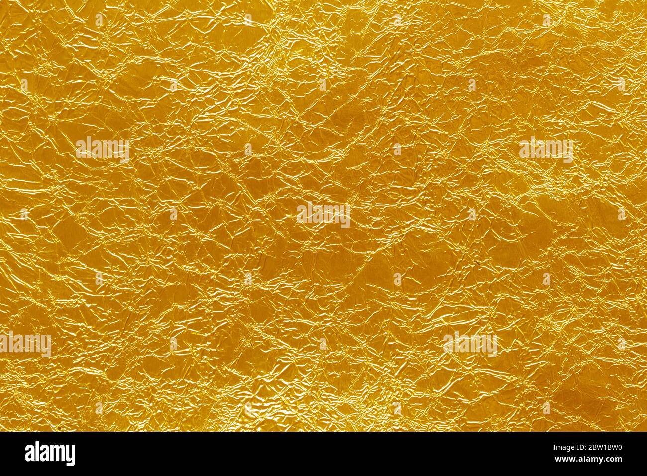 Gold foil abstract background texture Stock Photo - Alamy