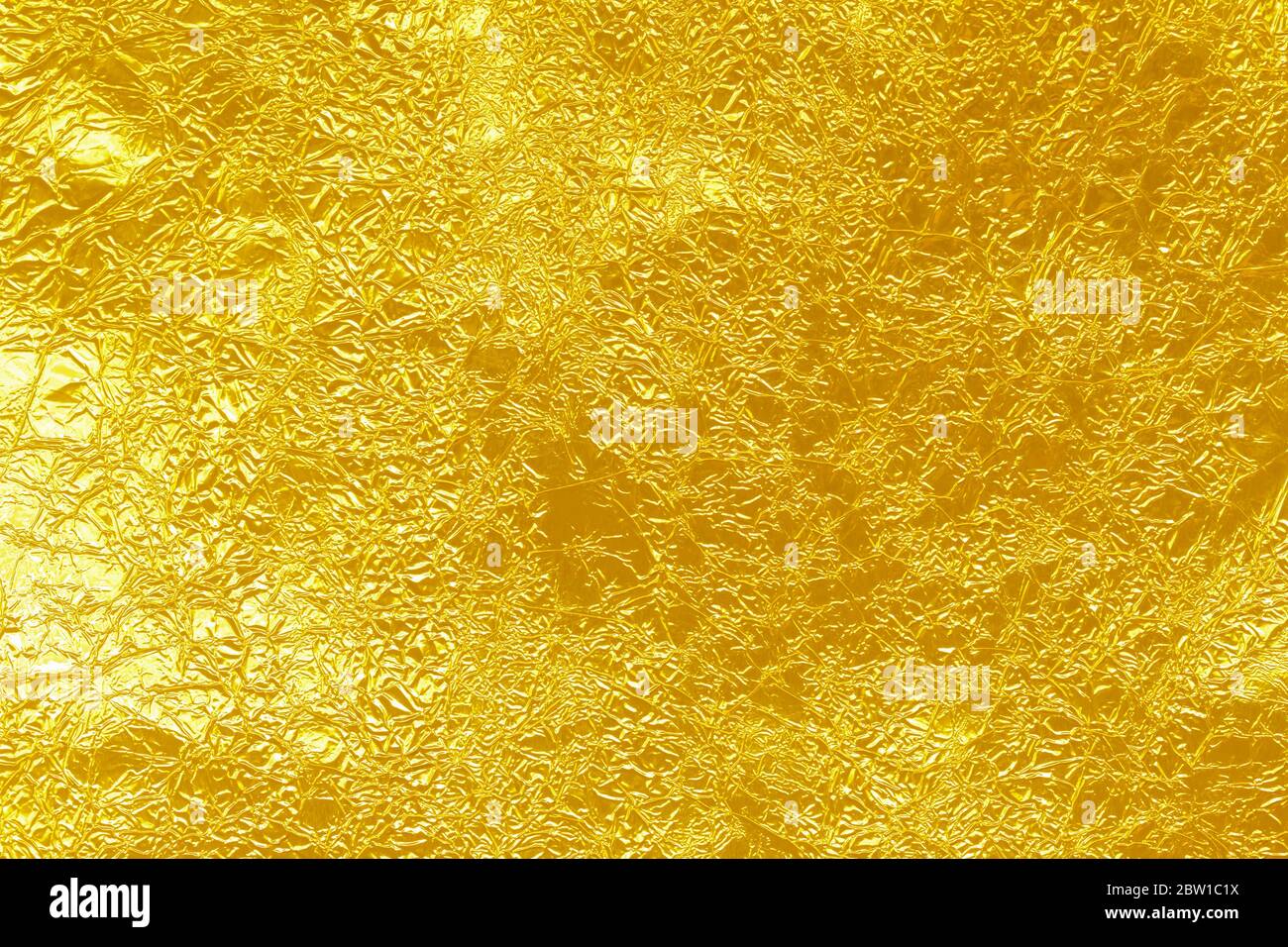 Gold foil abstract background texture Stock Photo - Alamy