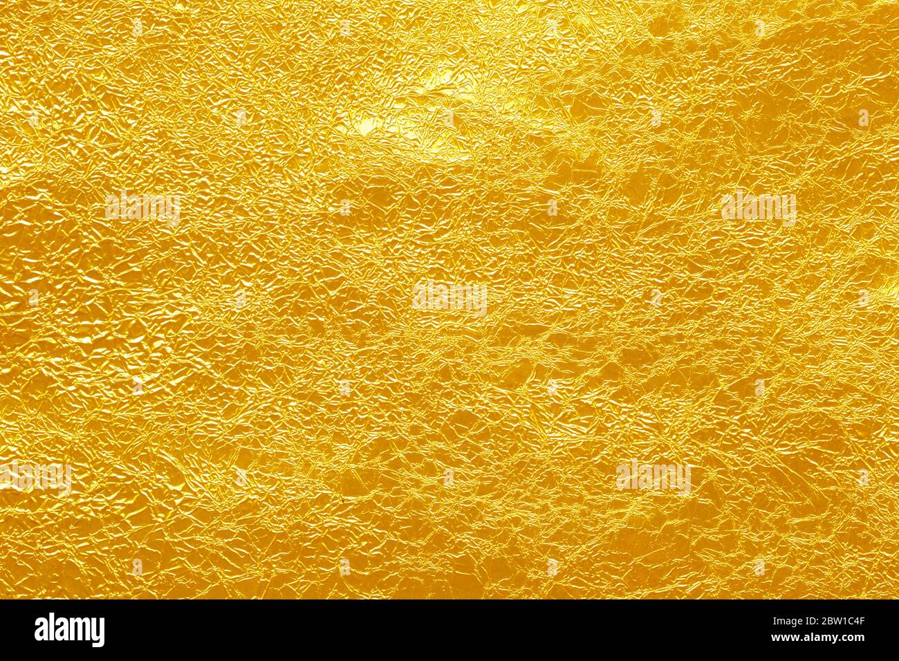 Gold foil abstract background texture Stock Photo - Alamy