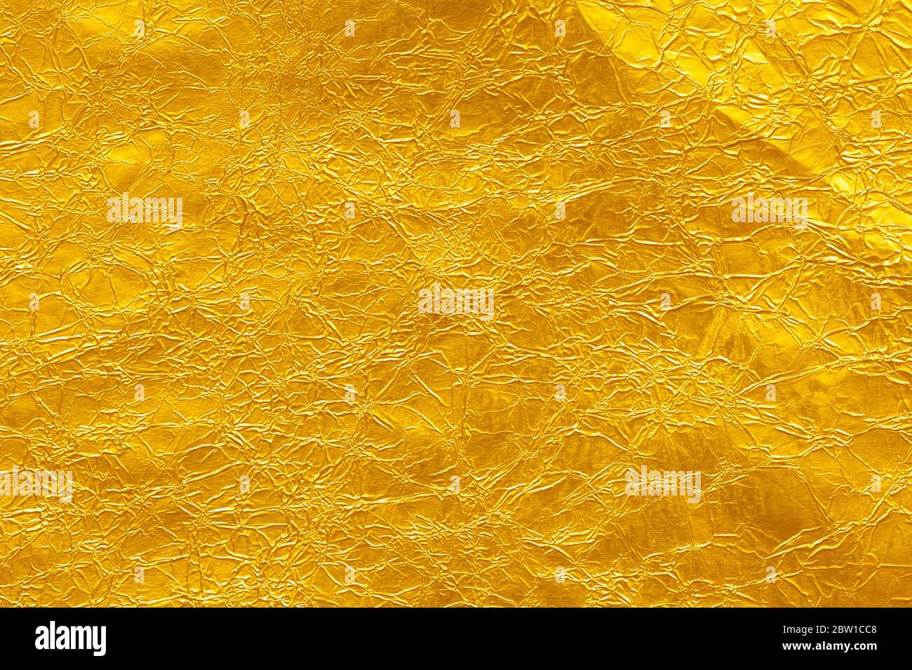 Gold foil abstract background texture Stock Photo - Alamy