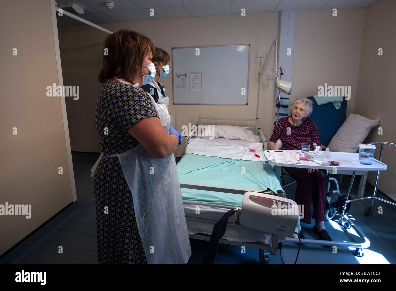 Rehab Support workers talk with Morag Ellison, 77, as the first ...