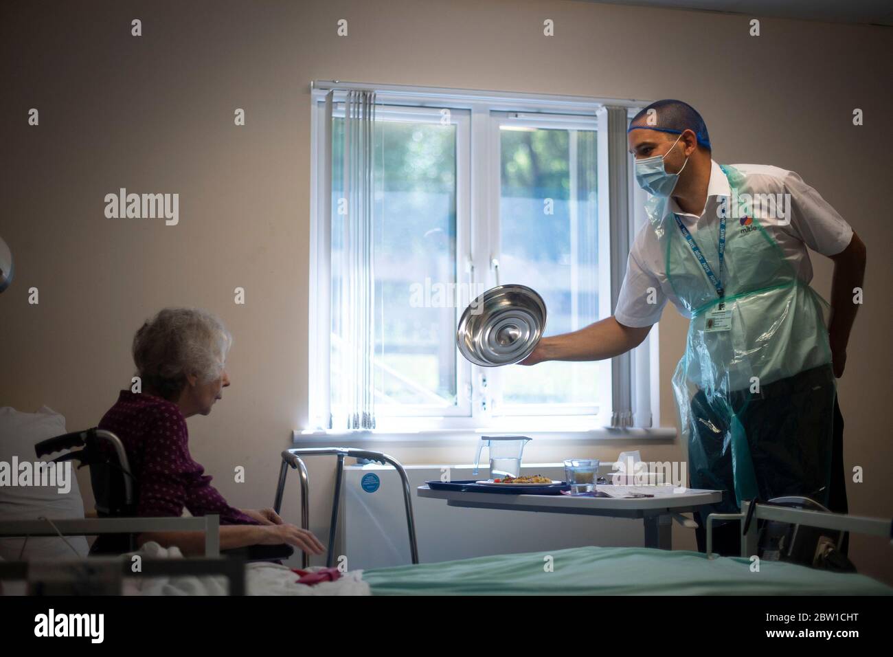 A lunch meal is served to Morag Ellison, 77, as the first patients are ...