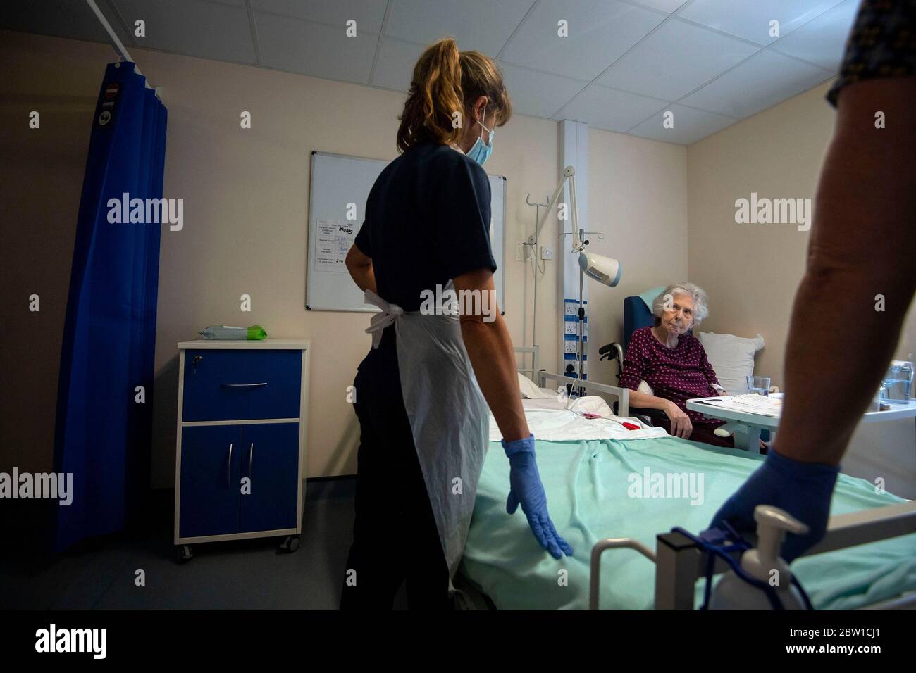 Rehab Support workers talk with Morag Ellison, 77, as the first ...