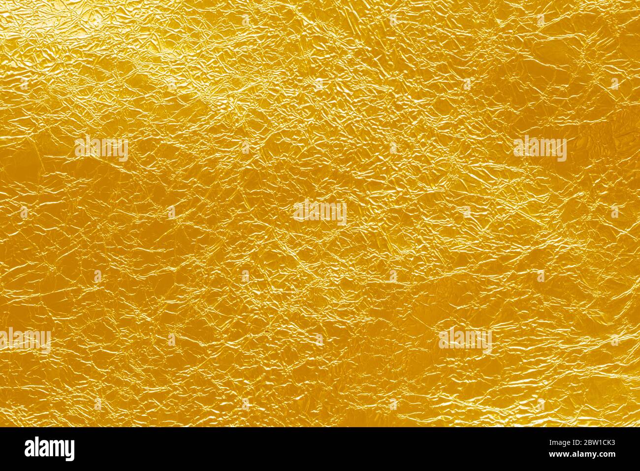 Gold foil abstract background texture Stock Photo - Alamy