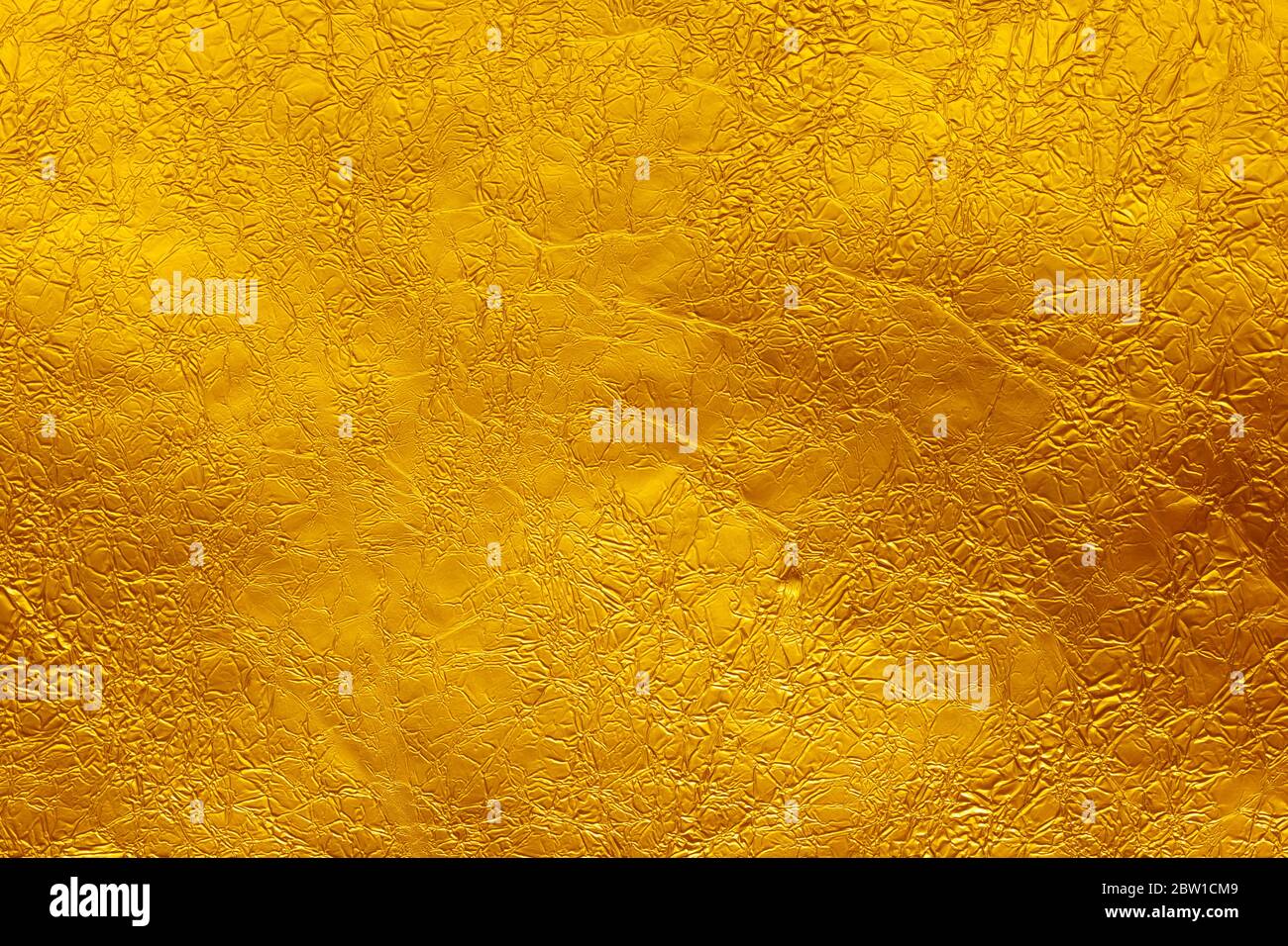 Gold foil abstract background texture Stock Photo - Alamy