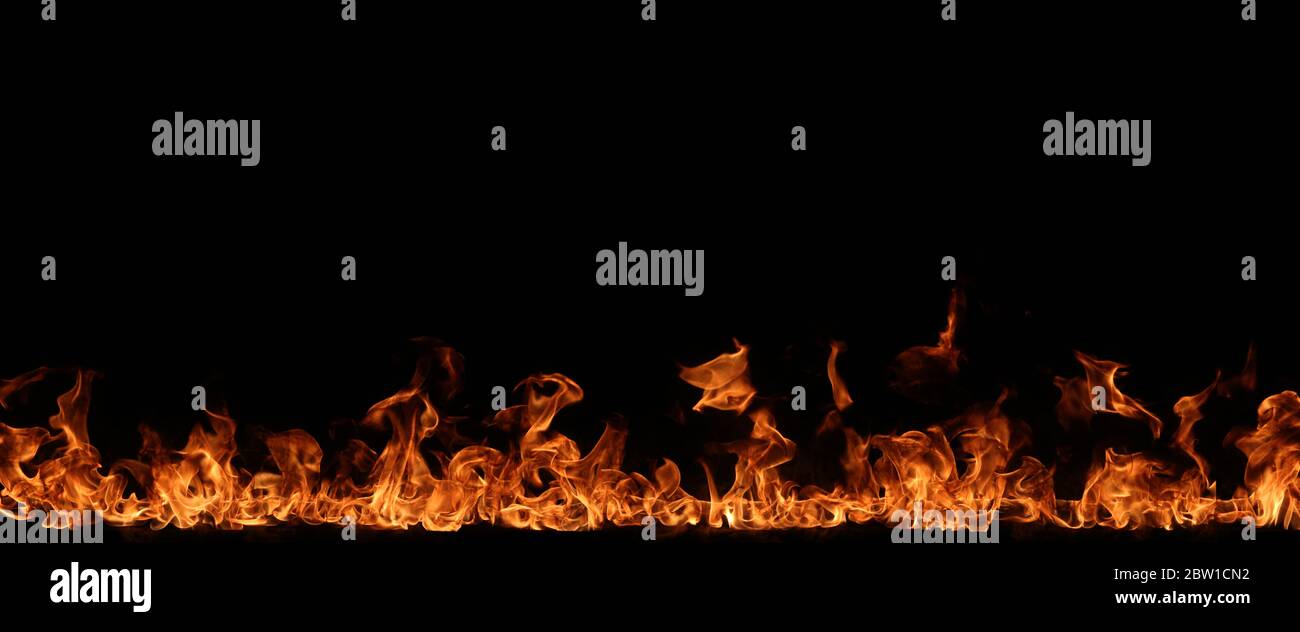 Fire flames on black background Stock Photo - Alamy