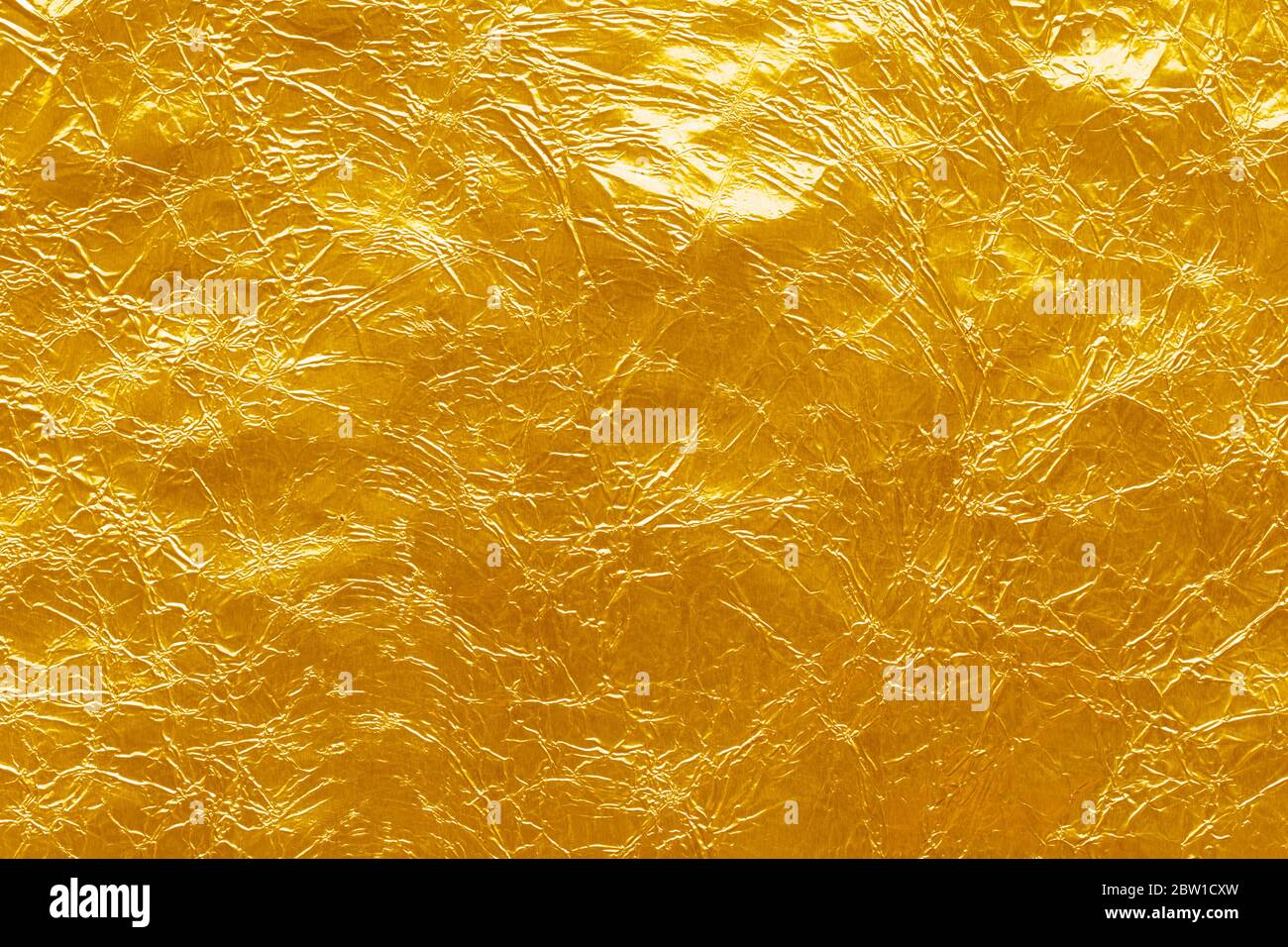 Gold foil abstract background texture Stock Photo - Alamy