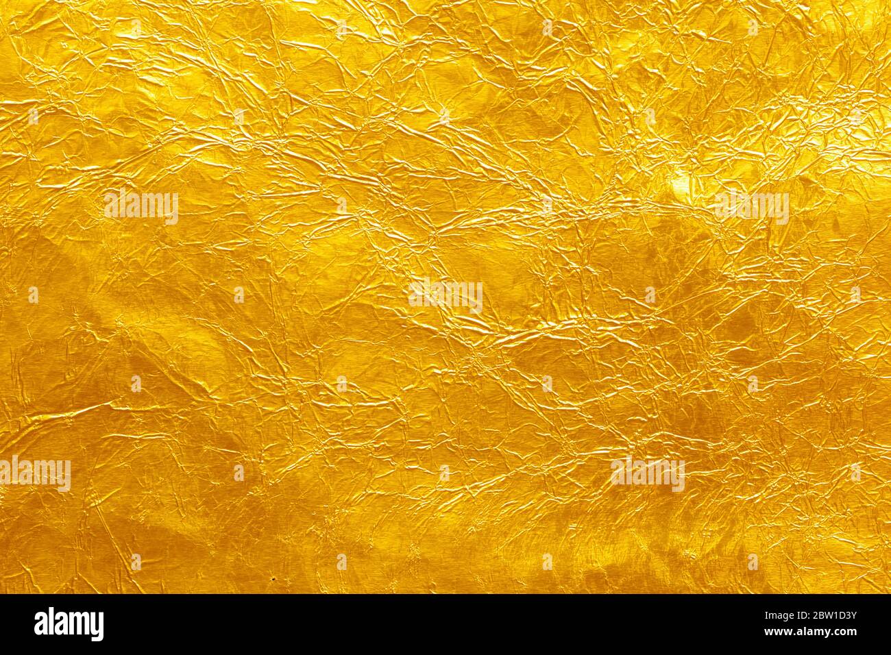 Gold foil abstract background texture Stock Photo - Alamy